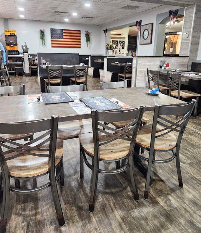 The dining room says "America" as loudly as apple pie, with its flag display and comfortable seating that invites you to settle in.
