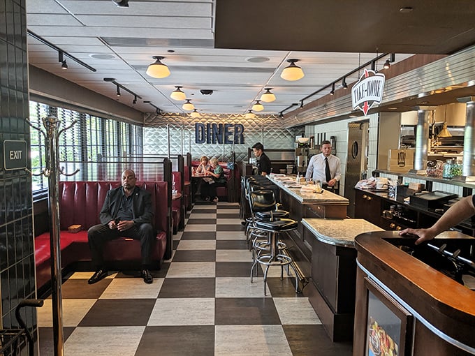 Classic black and white checkered floors meet red vinyl booths in this temple of elevated diner cuisine, where nostalgia gets a delicious upgrade.