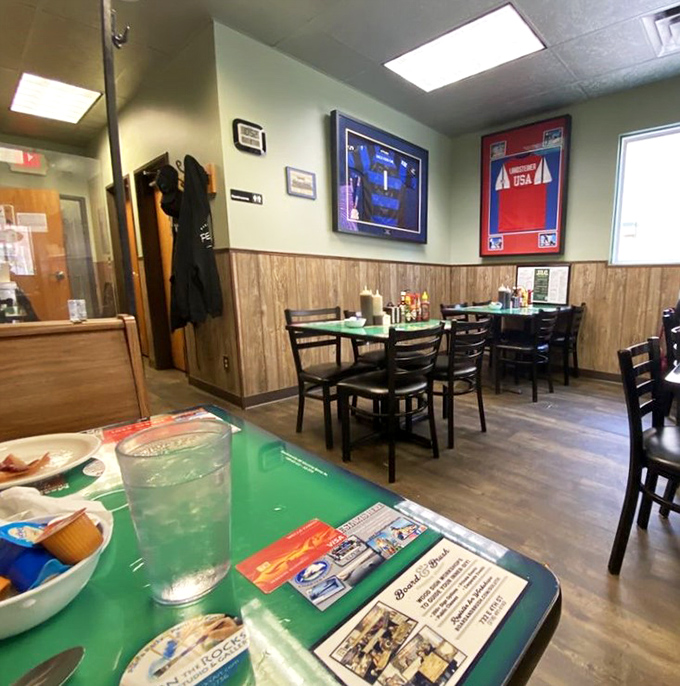 Classic wood paneling and sports memorabilia create that "been-here-forever" vibe that no amount of trendy restaurant design could ever replicate.
