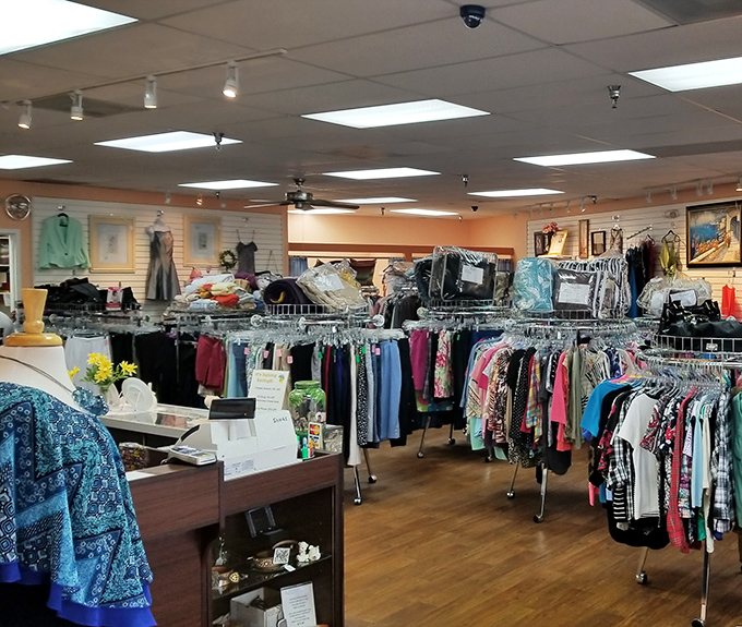 Clothing racks arranged with military precision make this thrift store feel more like a boutique than a bargain bin. No archaeological digging required!