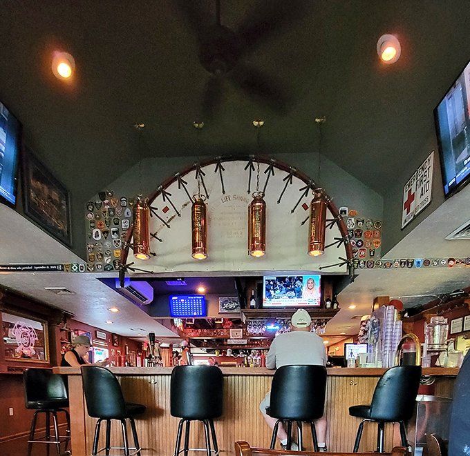 The bar area showcases the firefighting theme with impressive authenticity—those ladder-mounted lights aren't just decoration, they're conversation starters waiting to happen.