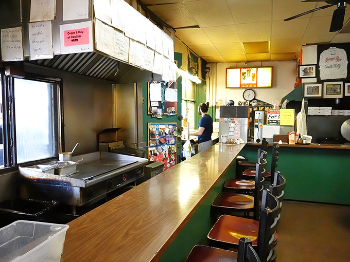 Inside Lorenzo's, the wood-paneled counter and no-nonsense stools tell you everything: this place prioritizes substance over style, just as food gods intended.