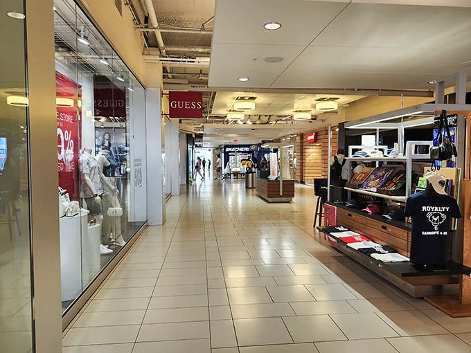 Gleaming floors and inviting storefronts create the perfect shopping runway. That Guess store isn't just suggesting fashion—it's practically demanding your attention.