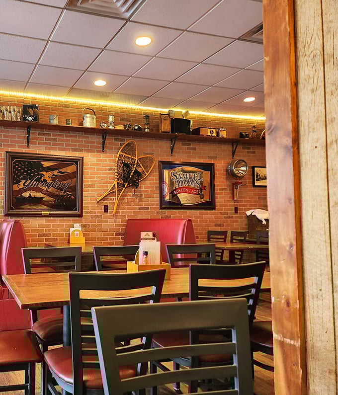 Exposed brick walls, vintage snowshoes, and red booths create that perfect "I've discovered something special" atmosphere that makes regulars out of first-timers.