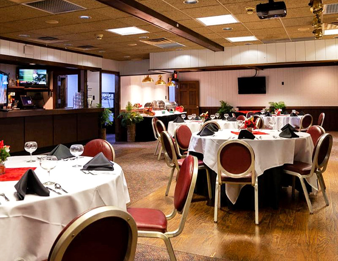 The dining room balances elegance with tavern charm &ndash; where white tablecloths meet sports bar energy in perfect Delaware harmony.