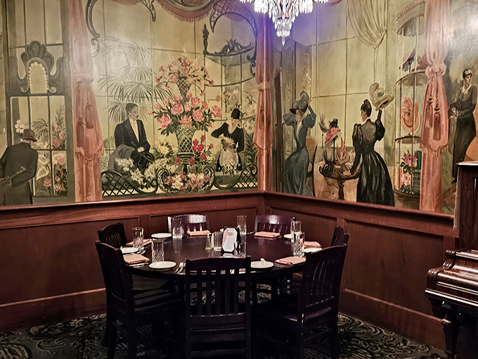 These hand-painted murals don't just decorate walls—they time-travel you to Phoenix's elegant past while you contemplate your steak future.