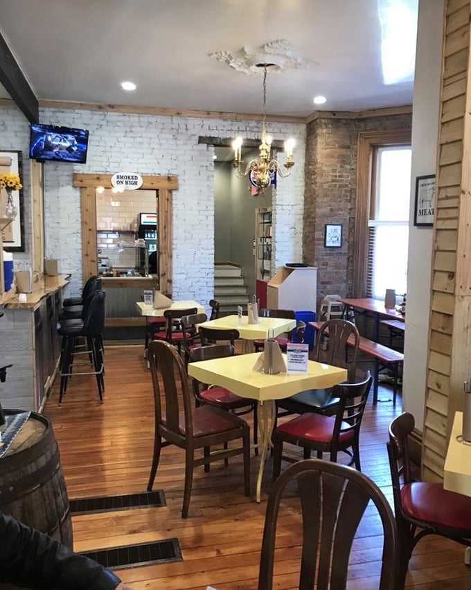 Inside, brick walls and wooden floors create the perfect backdrop for meat meditation. This isn't interior design—it's barbecue architecture at its most honest.