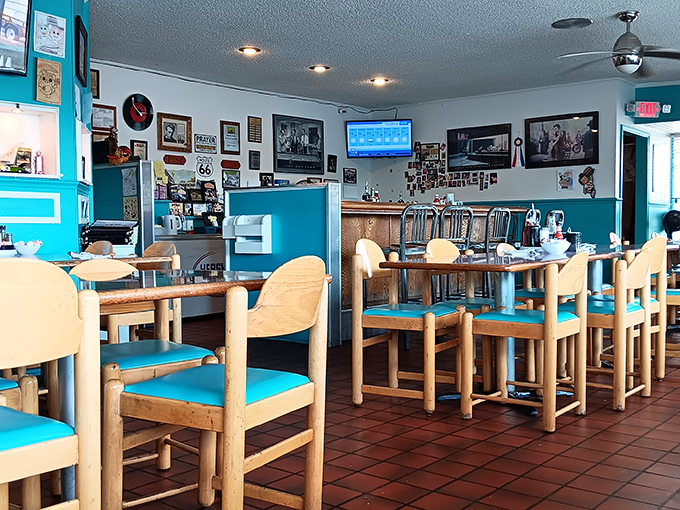 Step inside where turquoise booths and vintage memorabilia create the perfect backdrop for serious breakfast business.