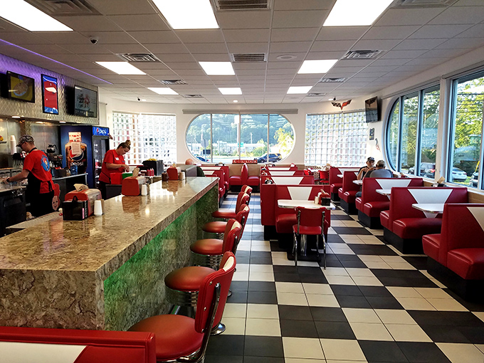 Classic checkerboard floors and cherry-red booths tell you everything you need to know before you even taste the food: this place takes its diner heritage seriously.