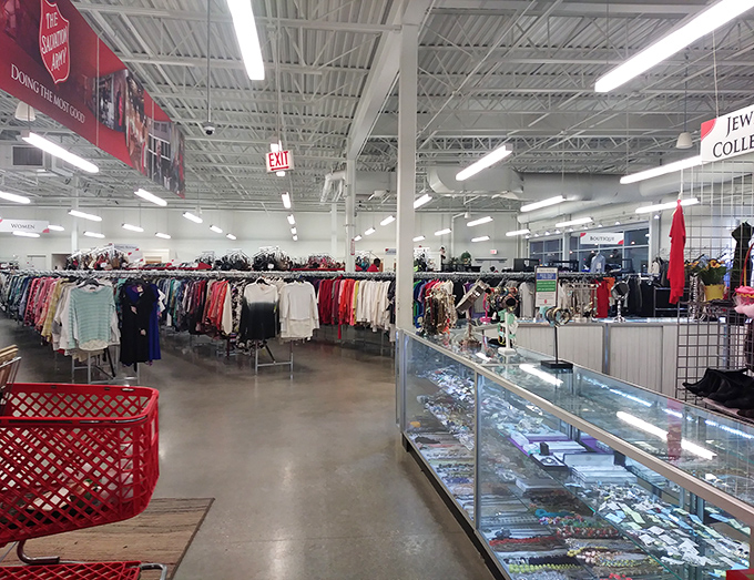 Inside, a retail wonderland unfolds with meticulously organized racks stretching toward the horizon. The jewelry counter gleams with potential finds.