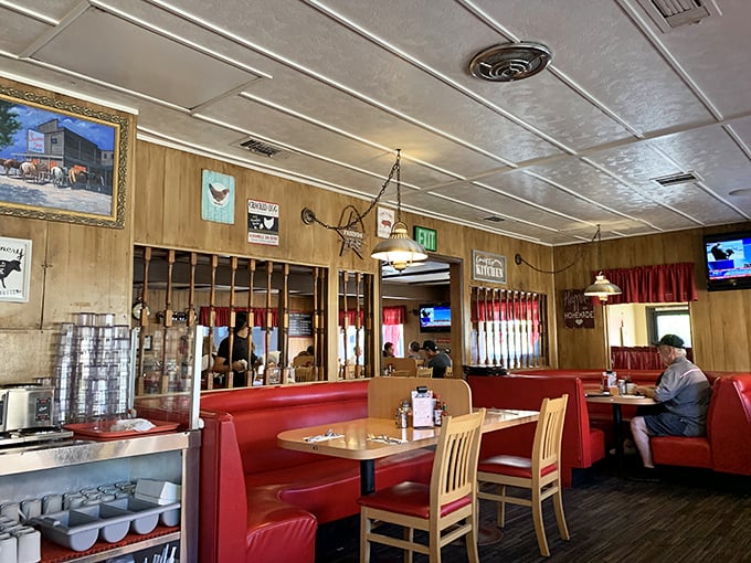 Red vinyl booths and wood-paneled walls tell you everything you need to know: comfort food ahead, diet plans postponed until further notice.