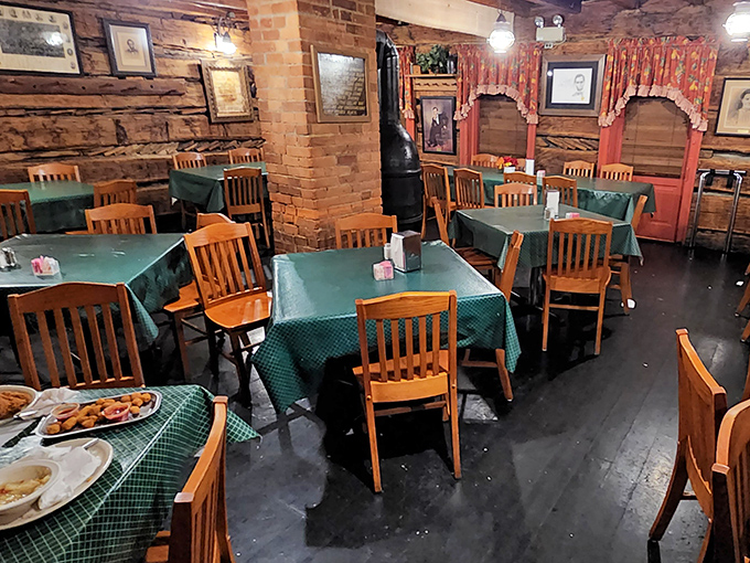 Original log walls from 1825 create an atmosphere no designer could buy. Dining here is like eating inside a living history book. 