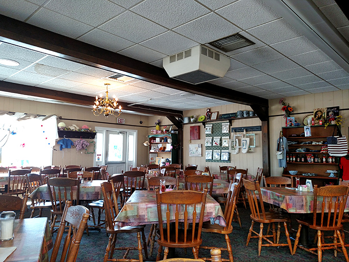 Wooden chairs, patterned tablecloths, and a chandelier that somehow works perfectly&mdash;this dining room feels like your favorite aunt's house, if she could cook for an army. 