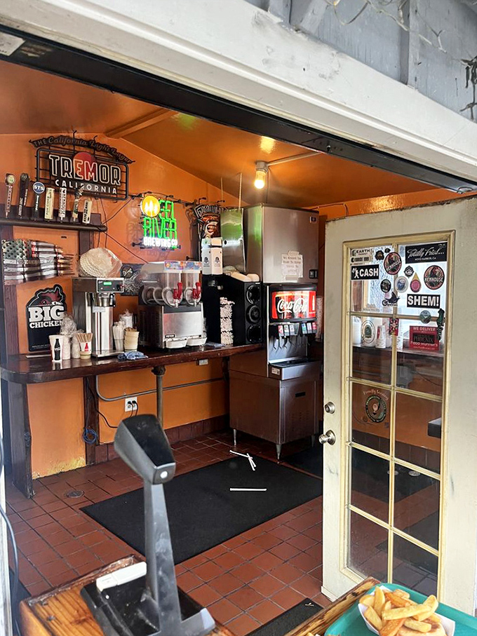 The compact interior reveals vintage signs and local memorabilia. This isn't interior design&mdash;it's authentic maritime history speaking through decades of coastal living.