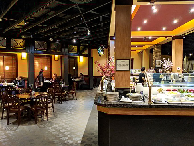 Warm wood tones, thoughtful lighting, and cherry blossoms create an atmosphere that says "special occasion" while still letting you show up in sneakers.