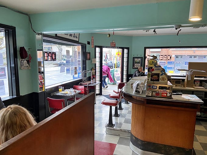 Mint green walls, checkerboard floors, and counter seating that invites you to belly up for breakfast—diner perfection in physical form.