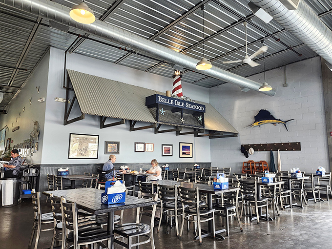 Inside Belle Isle, industrial chic meets maritime casual&mdash;metal chairs, exposed ductwork, and a mounted swordfish that seems to say, "You've made a wise choice."