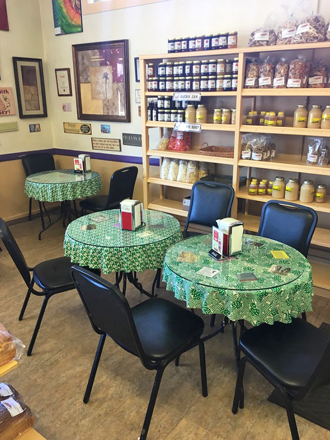 Those green tablecloths and shelves lined with homemade jams create the coziest vibe this side of your grandmother's kitchen.