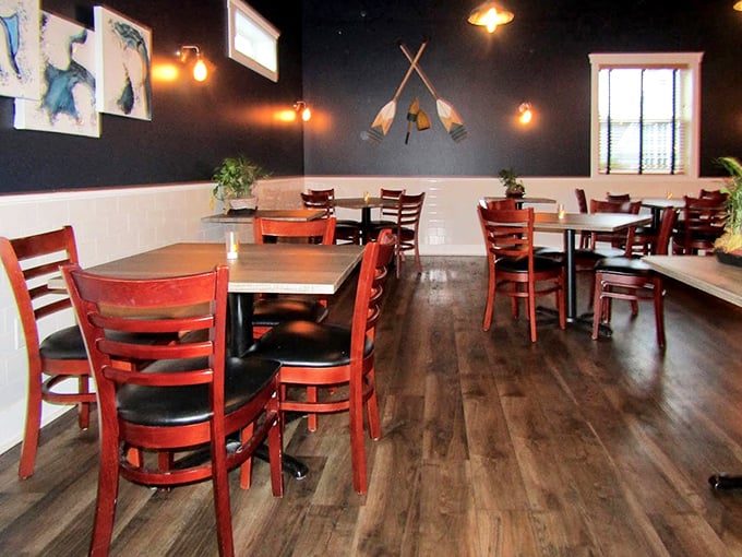 Dark walls and warm lighting create the perfect cozy atmosphere where crab leg casualties are expected and forgiven.