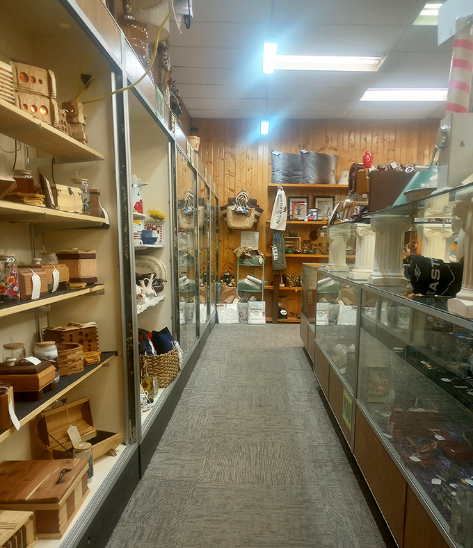 Narrow pathways between glass cases invite you to explore, like a museum where you can actually take the exhibits home.