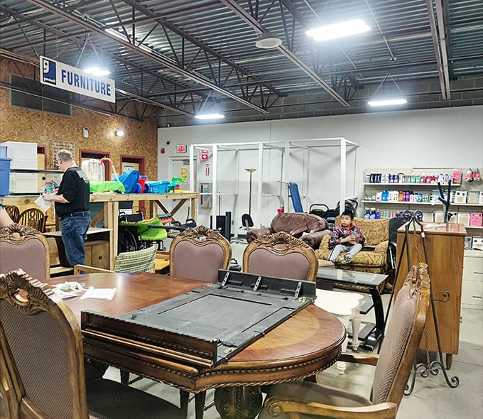 The furniture section &ndash; where dining sets with character await their second act in someone's home story. That ornate table has seen things.