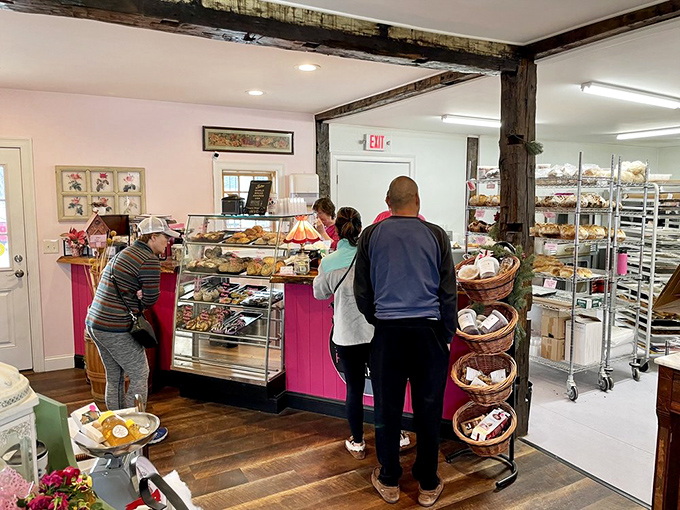 The morning rush at Flour Girl is like watching a delicious ballet—customers pointing, staff smiling, and pastries disappearing faster than you can say "diet."