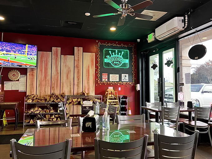 The interior strikes that perfect barbecue joint balance: rustic enough to feel authentic, comfortable enough that you'll want to linger over that last rib. 