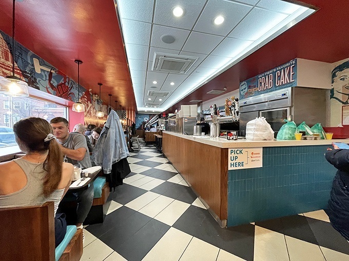 Classic black and white checkered floors lead you through a diner where conversations flow as freely as the coffee refills.