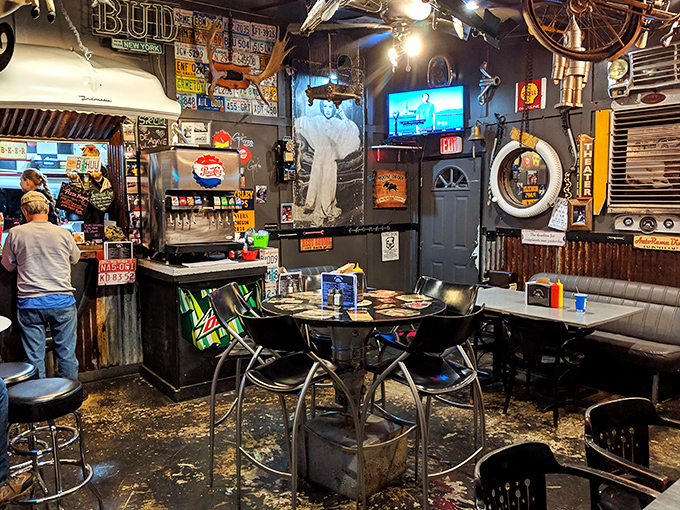 Inside feels like the coolest garage sale ever threw a party with the best diner in town. License plates included.