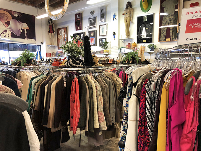 The walls tell stories of silver screen adventures while clothing that once lived in the spotlight now waits for a second act in your personal wardrobe.