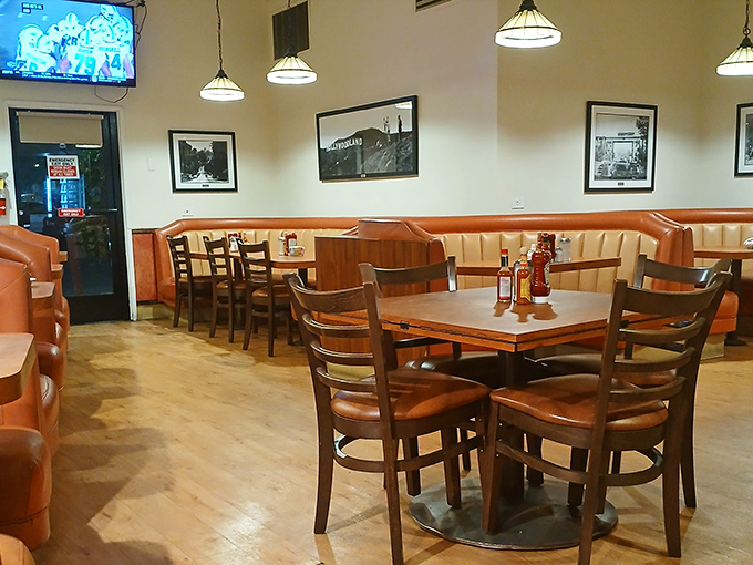 Orange vinyl booths and warm wood paneling create the perfect backdrop for life's big moments&mdash;or just Tuesday's breakfast. Classic diner perfection.