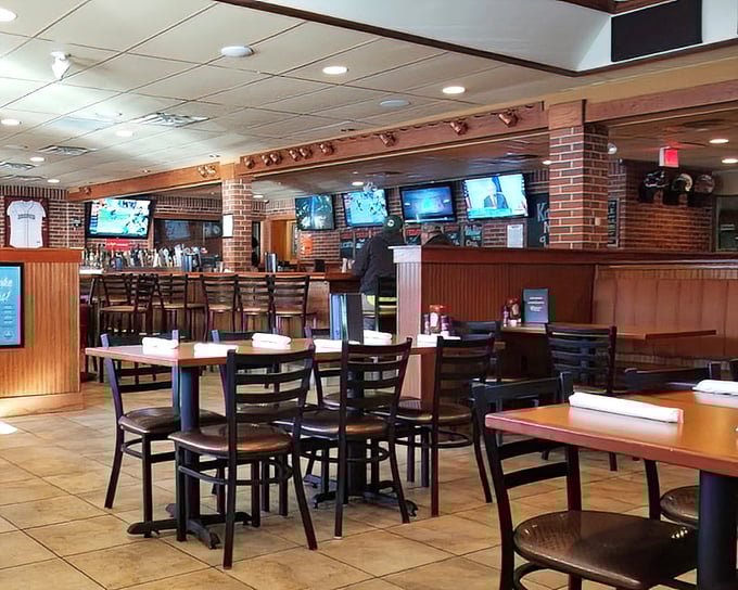 Inside, the perfect sports bar equation: enough TVs to catch every play, enough space to enjoy your meal without wearing someone else's jersey.
