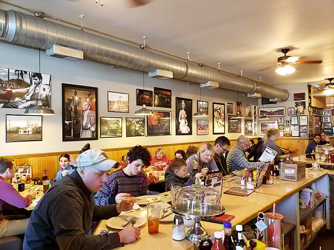 The wall of memories tells stories while diners create new ones. This isn't Instagram-live; it's life, happening around a counter where strangers become neighbors.