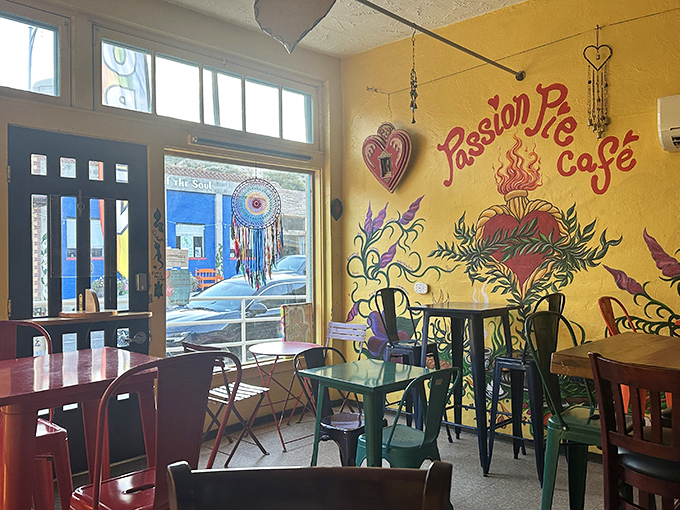 Sunshine-yellow walls adorned with vibrant heart murals create the perfect backdrop for morning contemplation. This isn't decoration; it's edible optimism. 