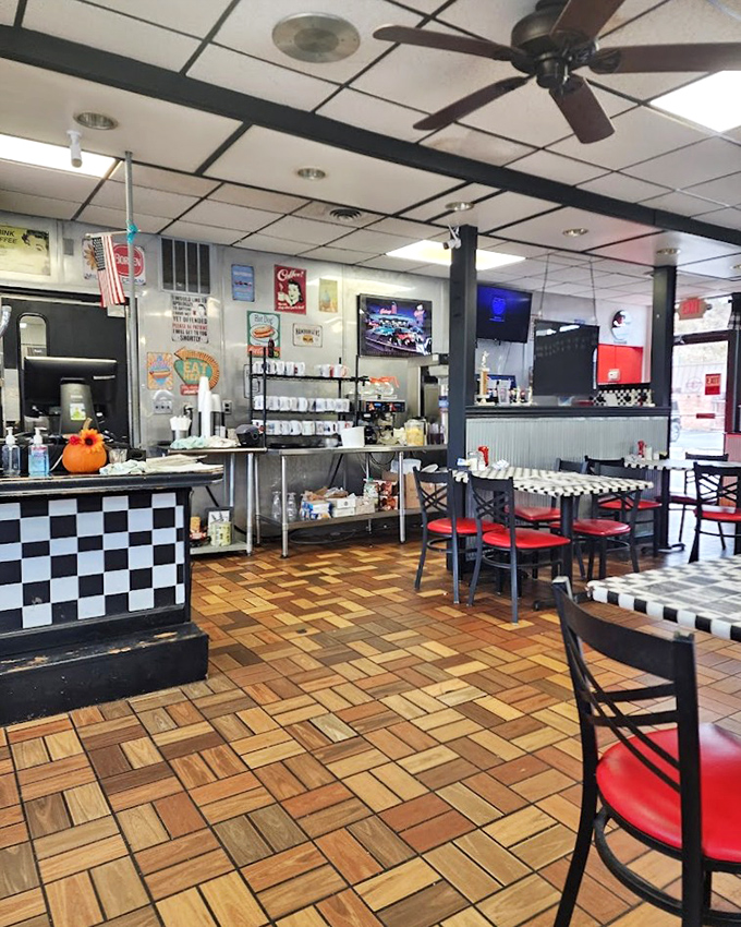 Classic checkered floors and red vinyl seats create that timeless diner atmosphere where calories don't count.