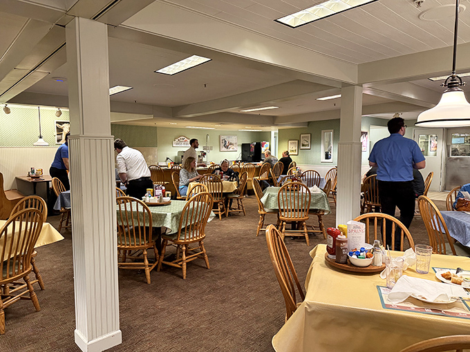 Inside, wooden Windsor chairs and cheerful tablecloths create that "grandma's dining room" feeling that no trendy bistro could ever replicate.