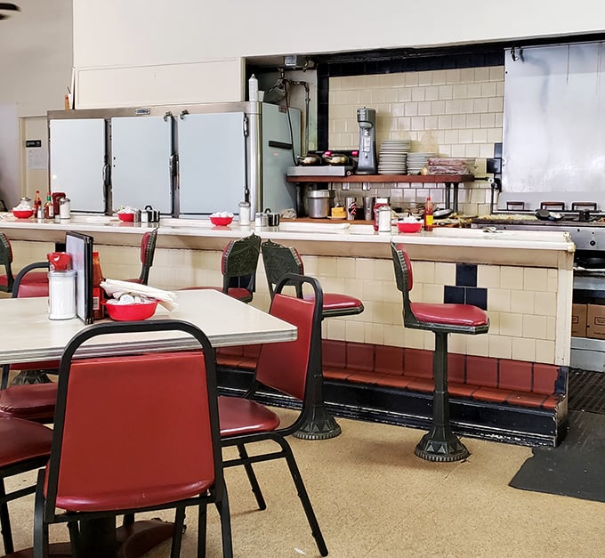Classic wood paneling and comfortable booths create that perfect diner atmosphere &ndash; like a warm hug from a friend who knows you need pancakes.