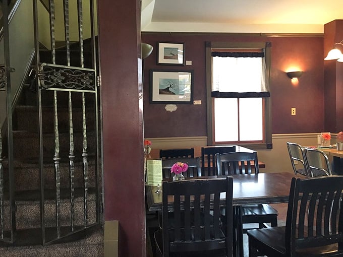 Purple walls and wooden accents create that perfect "fancy-but-not-too-fancy" vibe where both your foodie friend and comfort-food-loving grandma feel at home.