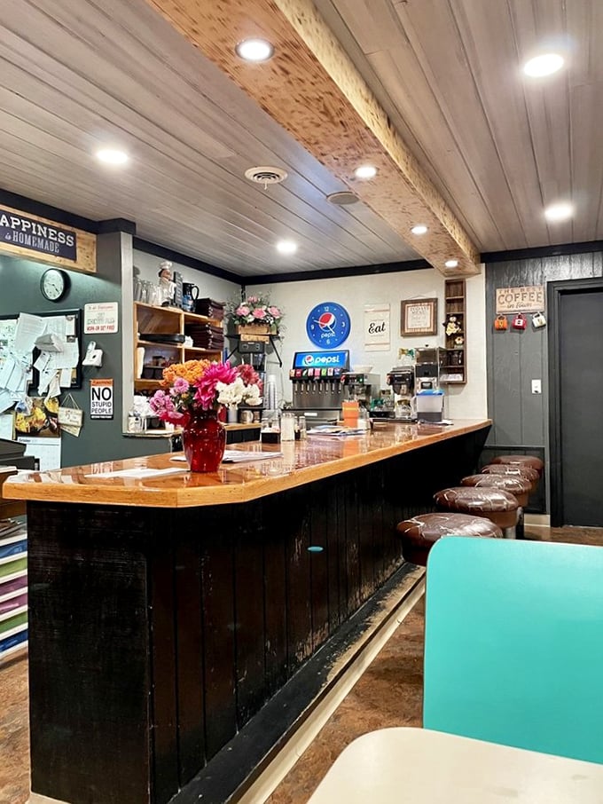 Classic diner counter magic – where polished wood meets friendly service, and those swivel stools practically invite you to spin like you're eight years old again.