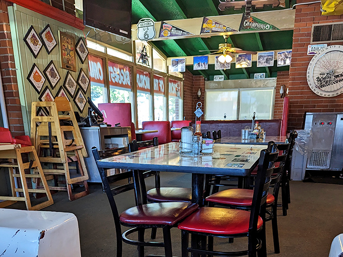 Nostalgia served family-style. The interior's Route 66 memorabilia and green ceiling beams create that perfect "been-here-forever" diner atmosphere we all crave.