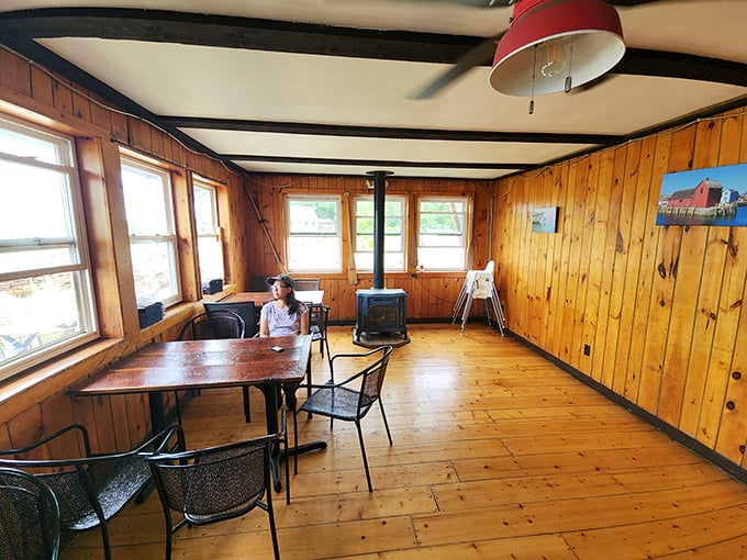 Knotty pine paneling and simple furnishings set the stage where seafood, not d&eacute;cor, plays the starring role. Like a fisherman's cabin that happens to serve incredible meals. 