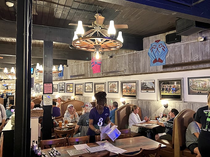 Step inside this rustic haven where weathered wood and warm lighting create the perfect barbecue sanctuary.