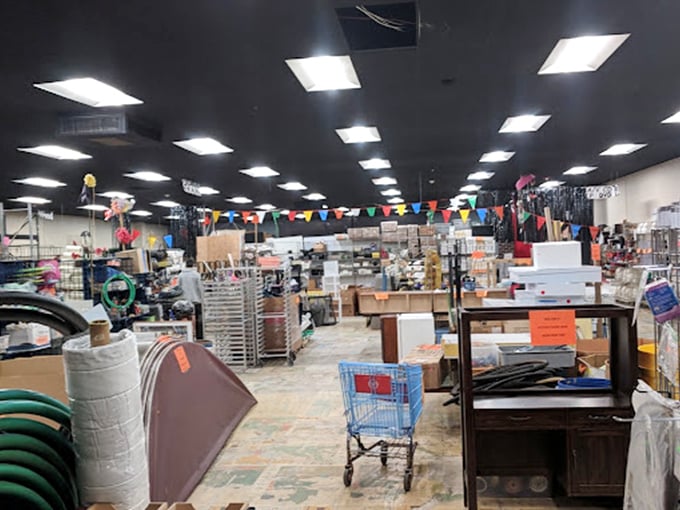 Colorful bunting hangs like permanent celebration flags above aisles of potential. Every shelf holds someone's next great creation.