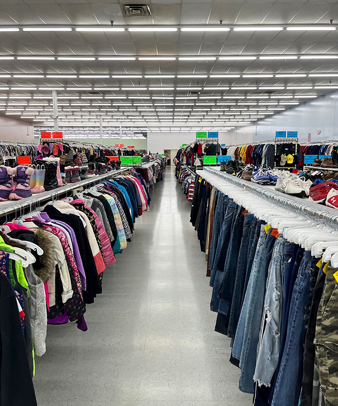 Endless racks stretch toward retail infinity, a kaleidoscope of secondhand possibilities waiting for their second chance at fashion glory.