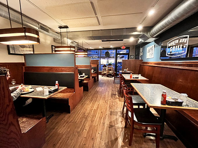 The cozy interior features comfortable booths and friendly lighting that makes lingering over coffee feel absolutely mandatory here.