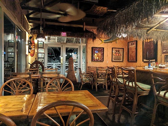 Thatched roofs and wooden chairs create an island vibe that says "relax, the ocean's treating today."