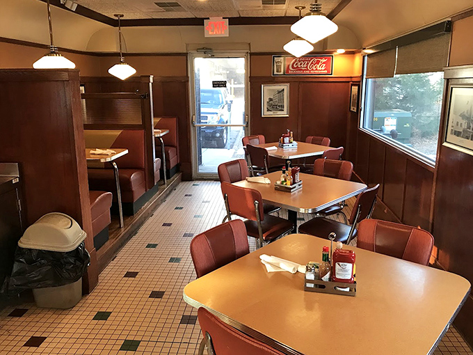 Step inside and you're transported to a simpler era—where conversations happen face-to-face and the booth cushions remember your favorite spot.