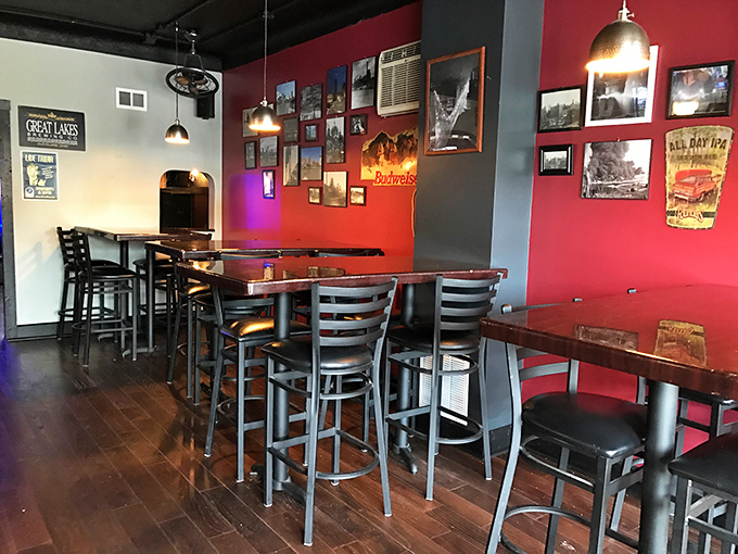 Red walls adorned with local memorabilia create the perfect backdrop for comfort food conversations. This isn't Instagram-engineered ambiance; it's the real deal.