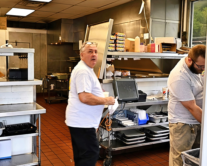 The kitchen ballet at Jerry's is a well-choreographed dance of efficiency, where every movement brings you one step closer to culinary bliss.