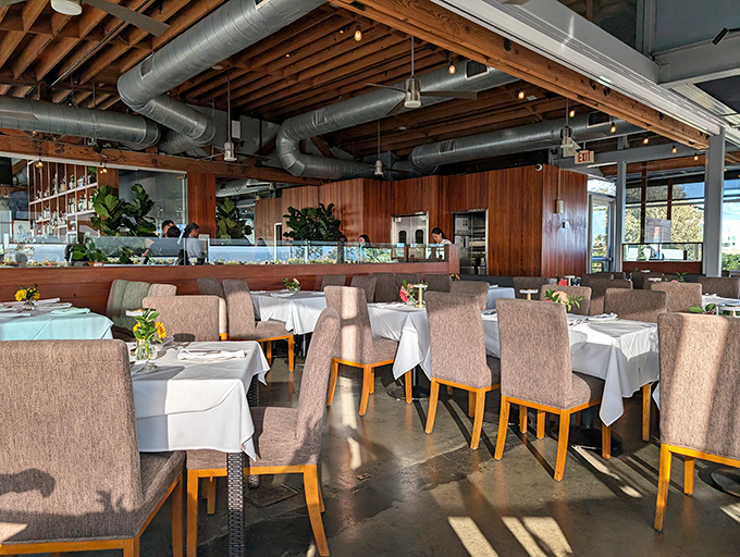 Warm wood, industrial chic, and those floor-to-ceiling windows &ndash; dining room perfection that lets California's natural beauty become part of your meal.